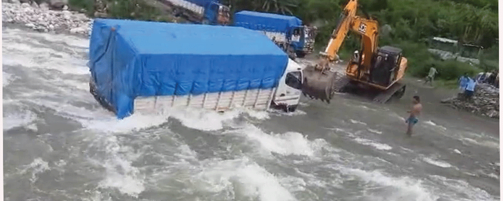 JCB resumes help for vehicles to cross Pilu River along the Karnali ...