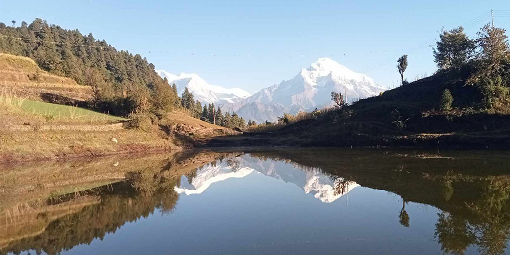 Annapurna and Nilgiri's reflection in Barah Lake
