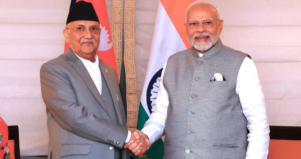 PM Oli meets Indian PM Modi